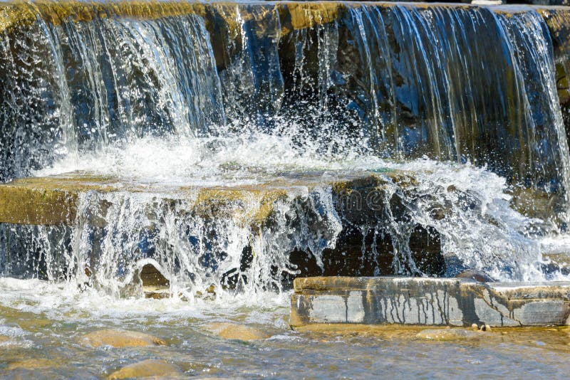 Water Splashes in an Artificial Cascading Waterfall Stock Image - Image ...