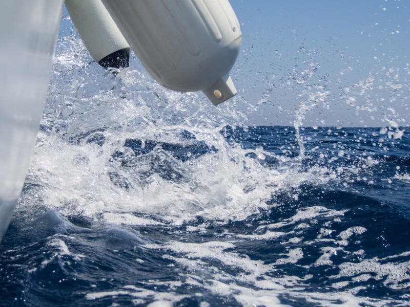 Water Splashes at the Board of a Boat Stock Photo - Image of sail, move ...