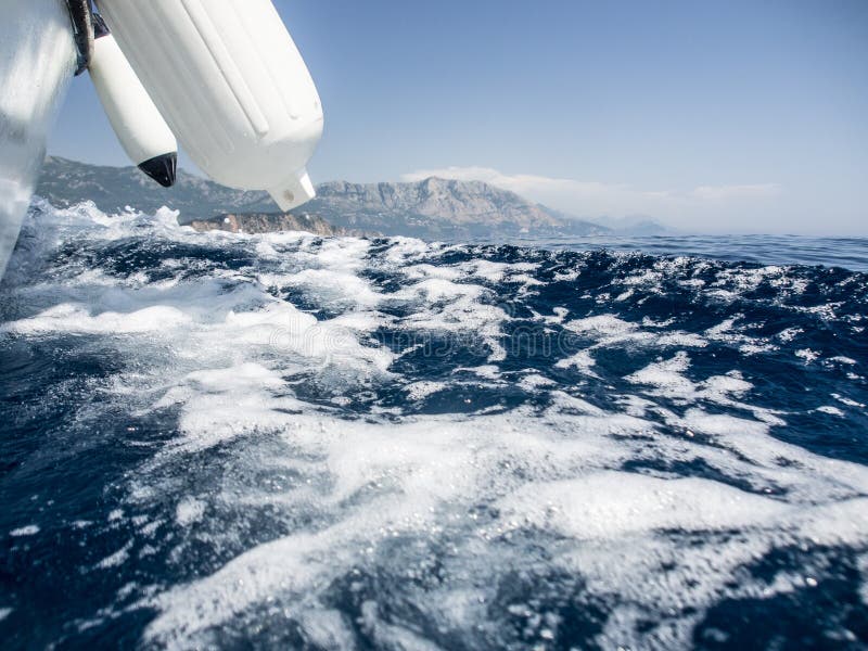 Water Splashes at the Board of a Boat Stock Photo - Image of motion ...