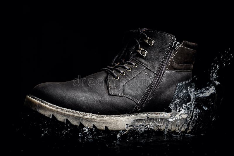 Water Splashes Under the Boot Stock Photo - Image of shoe, pair: 264840124