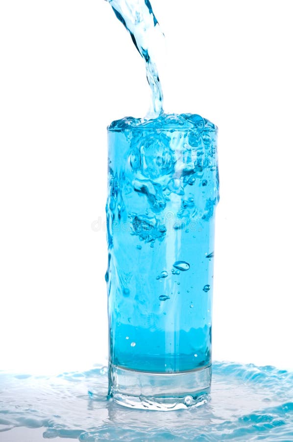 Overflowing cup of water stock photo. Image of contrast - 14160716