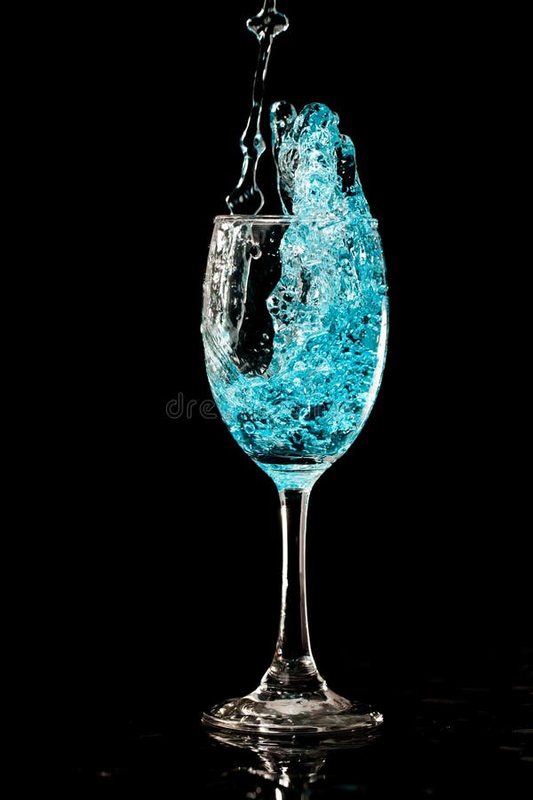 Water splashing in a glass stock photo. Image of clear - 40513342