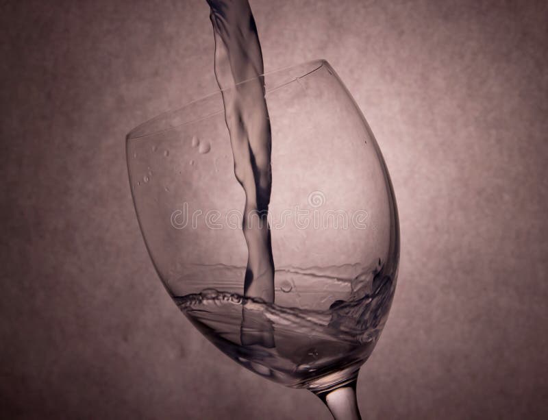 Water Splashing in Glass stock image. Image of vine, splash - 46932965