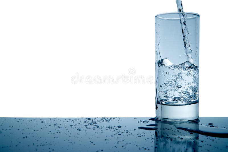 Water Splashing in a Glass and on the Table with Copyspace, and Blue ...