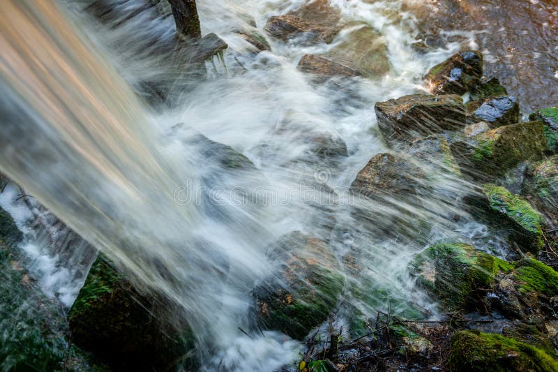 Water Splashing from Impact Onto Rocks. Stream of Clean Falling Water ...