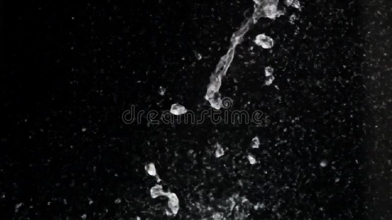 Splashing Water Droplets Rising Against Dark Background Slow Motion ...