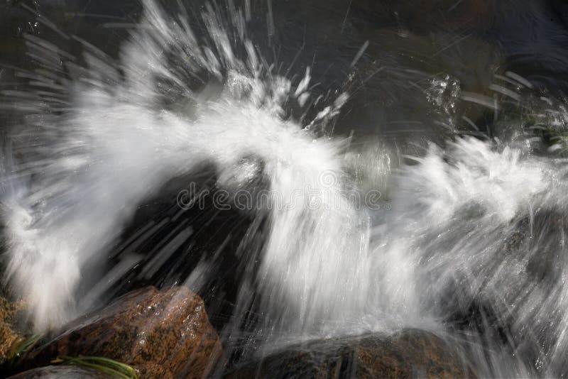 Water splashing on rocks stock image. Image of stone, water - 7634085
