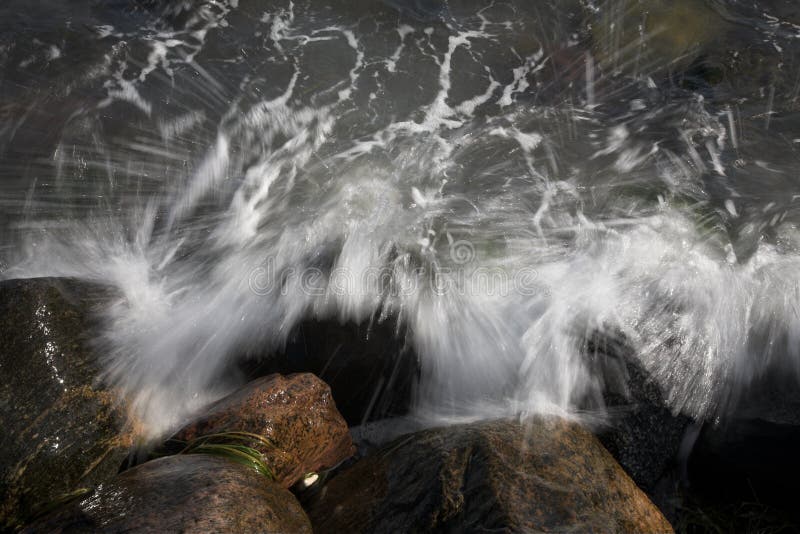 Water splashing on rocks stock image. Image of stone, splash - 8468771