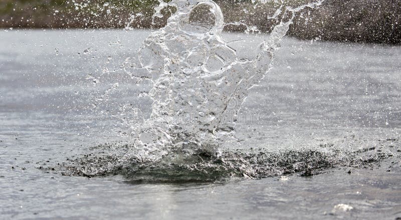 Water Splashing from a Stone in the River Stock Photo - Image of foam ...