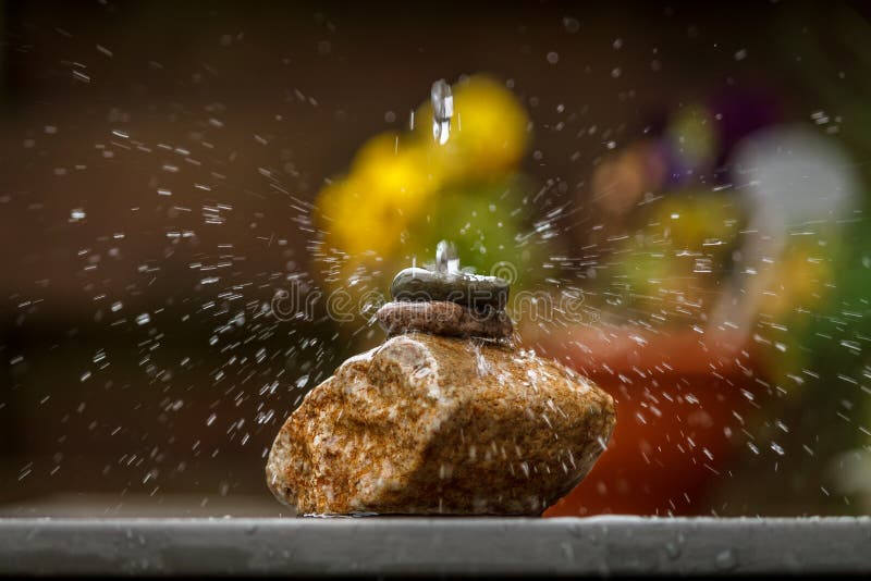 Water splashing on stones stock image. Image of stone - 42614091
