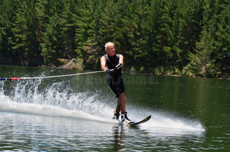 A young man water skiing stock photo. Image of adult, skiing - 6075908