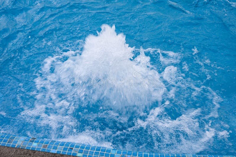 Water Spouting in Swimming Pool Stock Image - Image of liquid, gentle ...