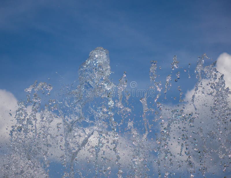 Water Spray Against the Sky in the Sunlight Stock Photo - Image of ...
