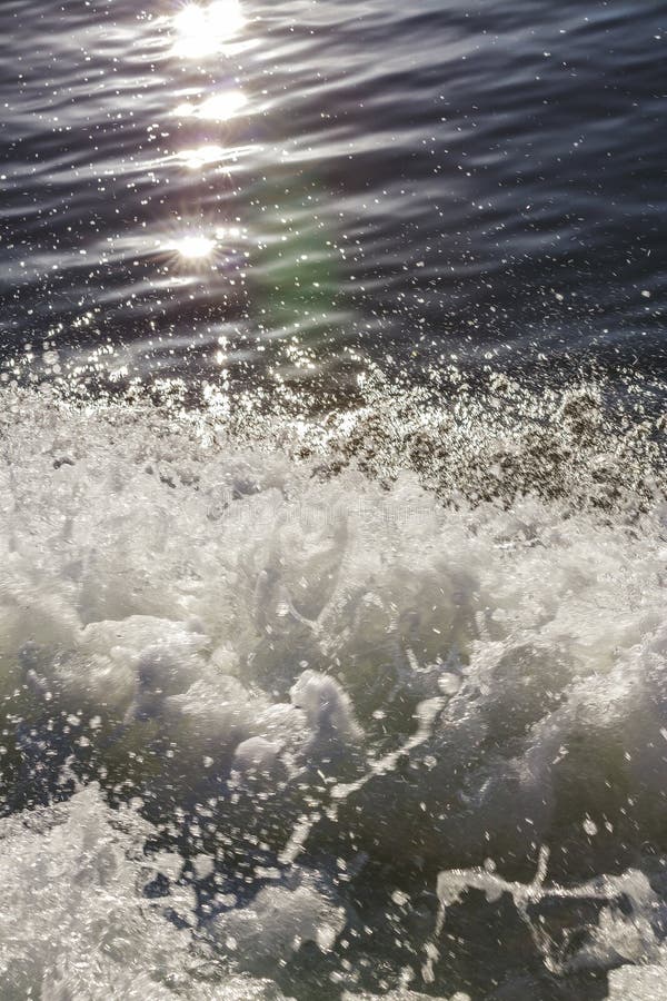 Spray of Water Splashes Along the Side of the Boat Stock Photo - Image ...