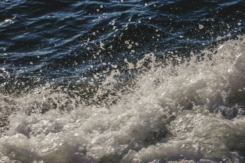Spray of Water Splashes Along the Side of the Boat Stock Photo - Image ...