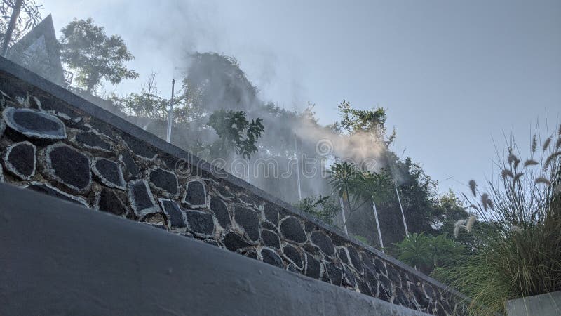 Water is Sprayed from a Misting Device Stock Photo - Image of wind ...