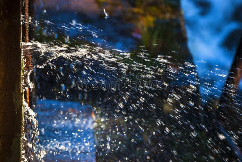 Water spraying from a leak stock image. Image of splash - 252509507