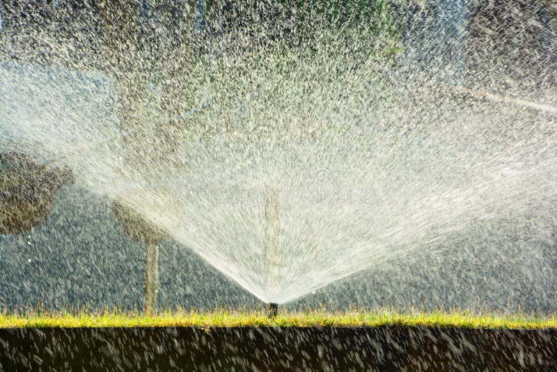 Water Spraying from Sprinkler Stock Image - Image of landscaping, lawn ...