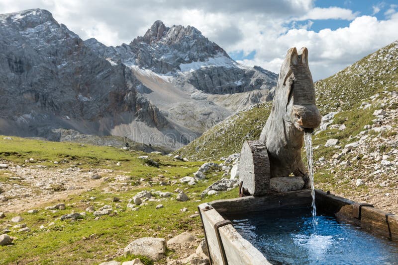 Water Spring on Alps Mountains Background. Stock Image - Image of ...