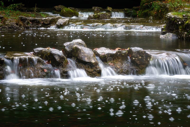 Water Spring in Nature with a Stream and Waterfalls Stock Photo - Image ...