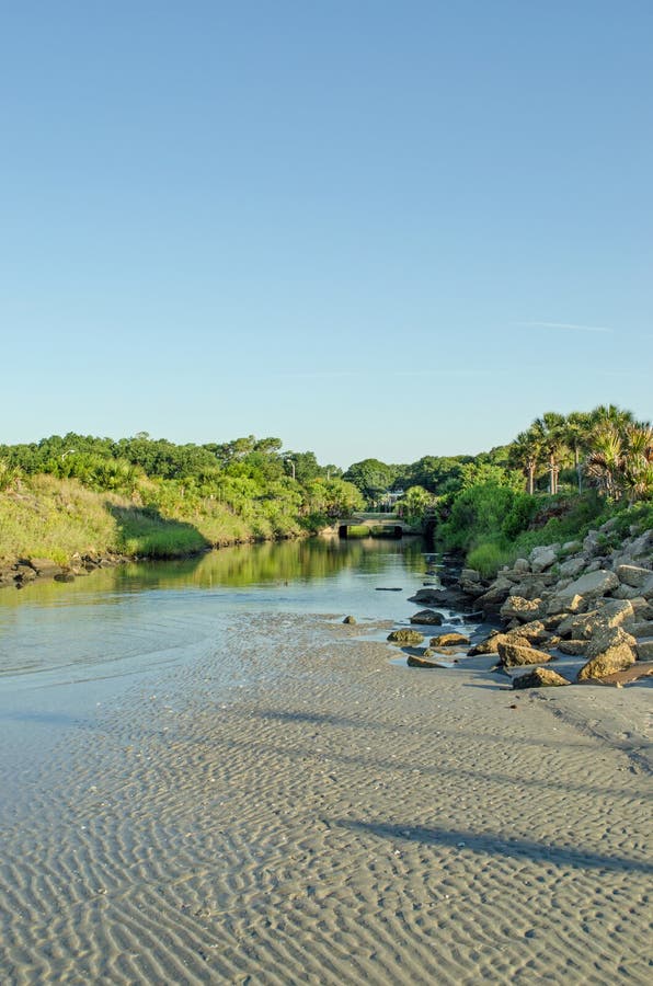 Water spring and sand stock image. Image of beach, clouds - 111193967