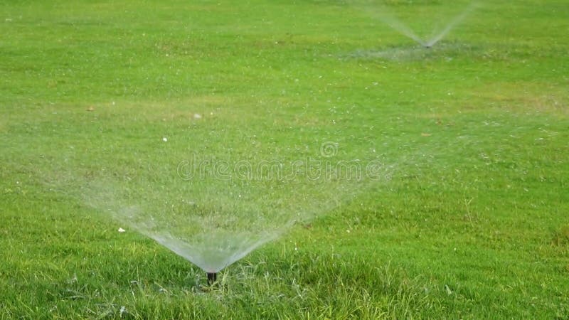 Water sprinkle stock footage. Video of grassland, device - 42677678