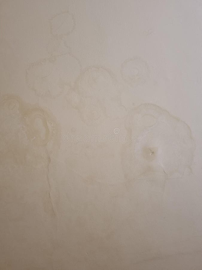 Water stain on beige wall stock photo. Image of indoor - 360079518