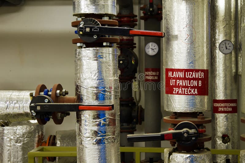 Steam pipe with a valve stock image. Image of flanges - 10732699