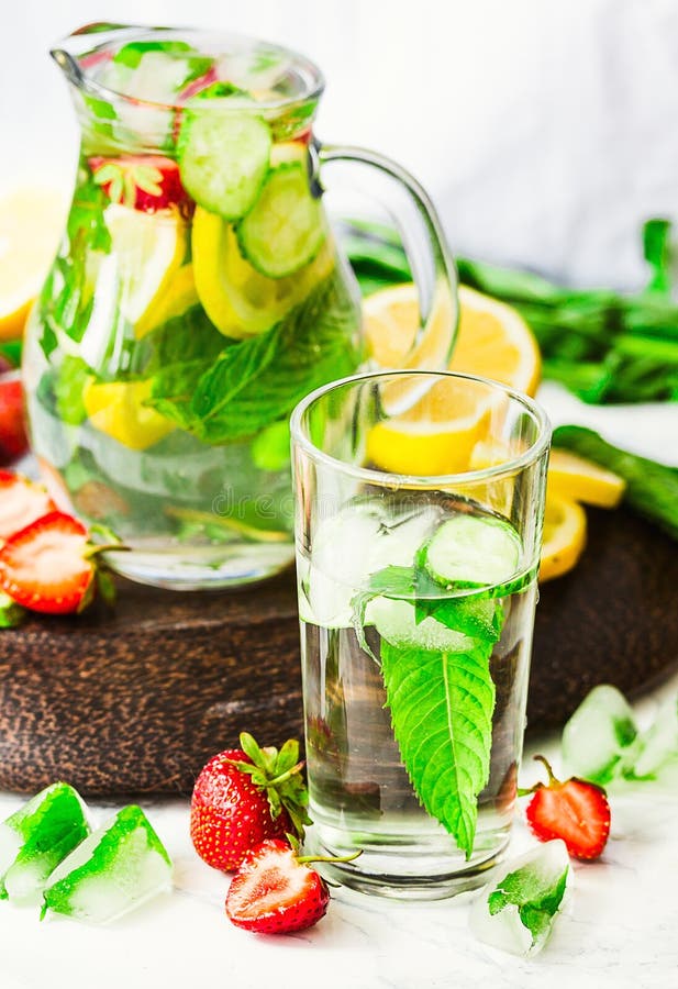 Water with Strawberries, Lemon, Ice, Mint. Detox. Stock Image - Image ...