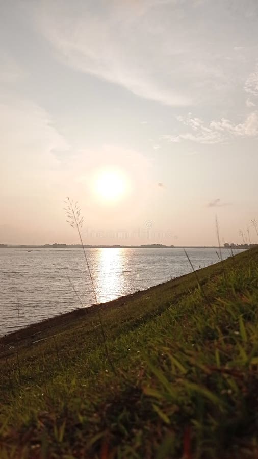 Water Sun Cloud Light Grass Wall Stock Image - Image of wave, ocean ...