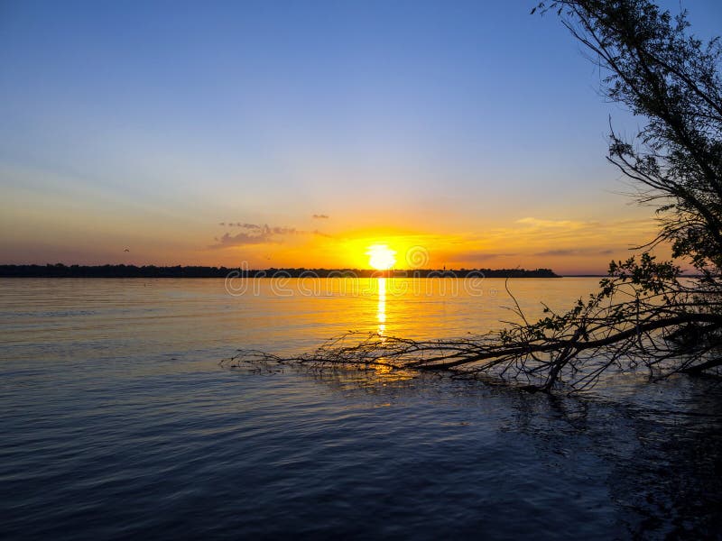 Water sunset stock photo. Image of scene, horizon, coastline - 99306214