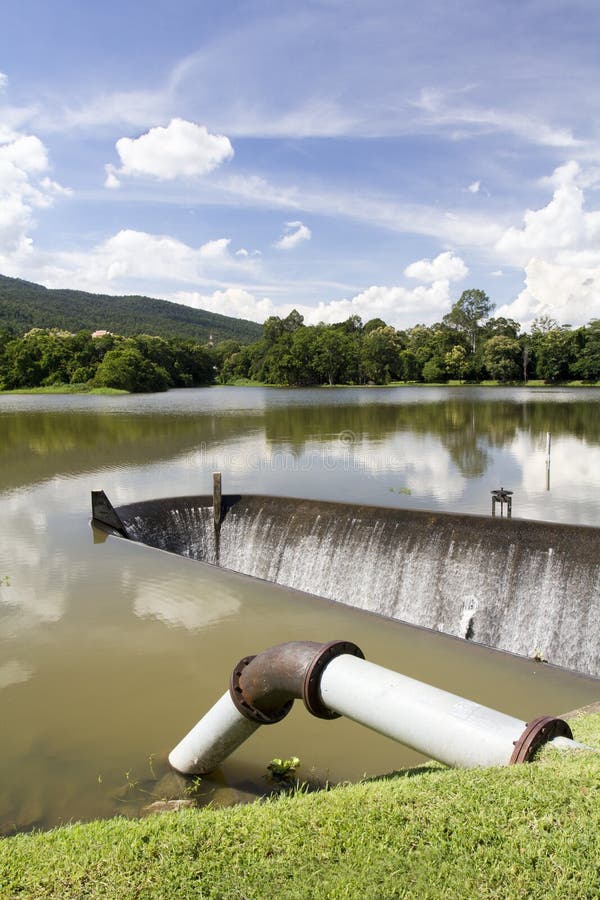 Water supply pipe and dam stock photo. Image of industrial - 33456728