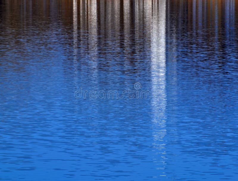 Mirror-like Surface Of Water Stock Image - Image of water, yellow: 23557427