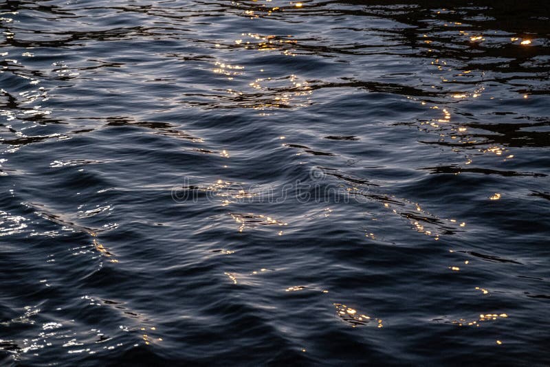 Water Surface with Reflections in the Evening Stock Photo - Image of ...
