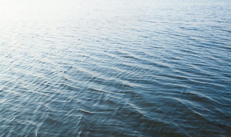 Water surface with ripples stock photo. Image of reservoir - 258549500