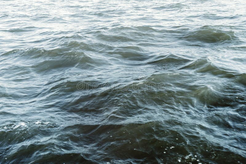 Water Surface with Ripples and Sunlight Reflections Stock Image - Image ...