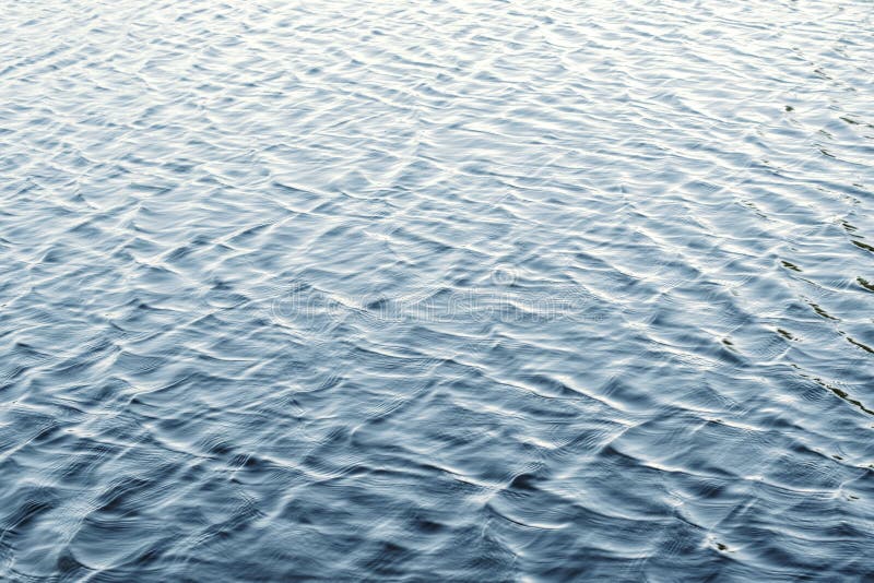 Water Surface with Ripples and Sunlight Reflections Stock Photo - Image ...