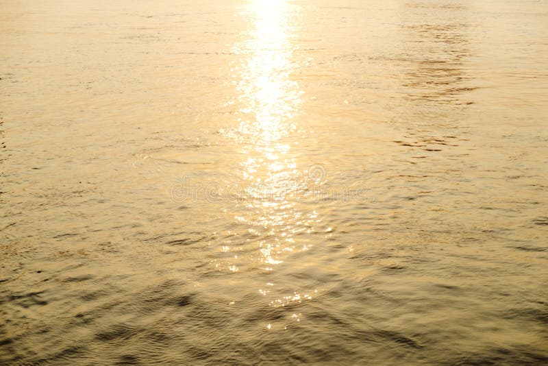 Water Surface with Ripples and Sunlight Reflections Stock Image - Image ...