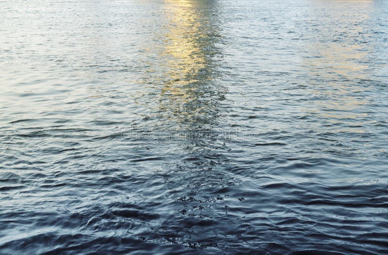 Water Surface with Ripples and Sunlight Reflections Stock Photo - Image ...