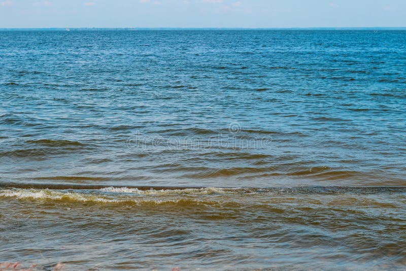 Water Surface with Small Waves Stock Photo - Image of light, evening ...