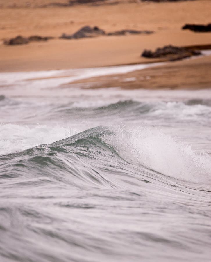 Water Surface. Wave Photography with Sand on Background Stock Image ...
