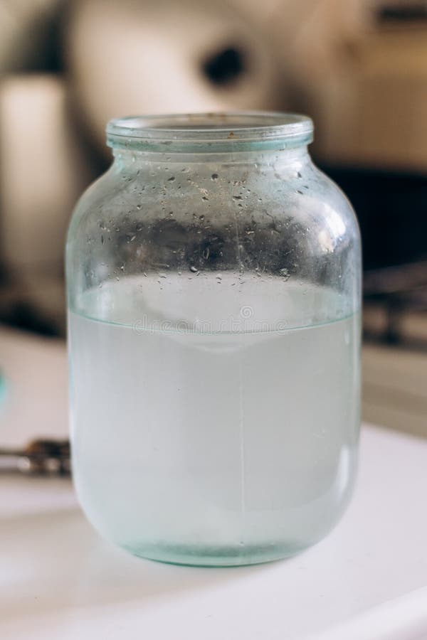Water Swirls in a Glass Jar. Stirring the Liquid Stock Photo - Image of ...