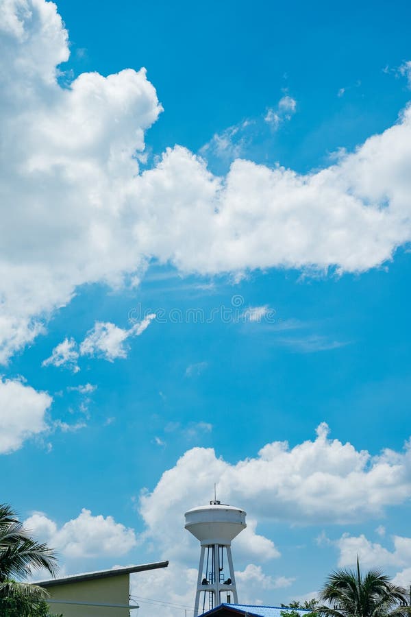 Water Tank with Clear Blue Sky Stock Photo - Image of airplane, clouds ...