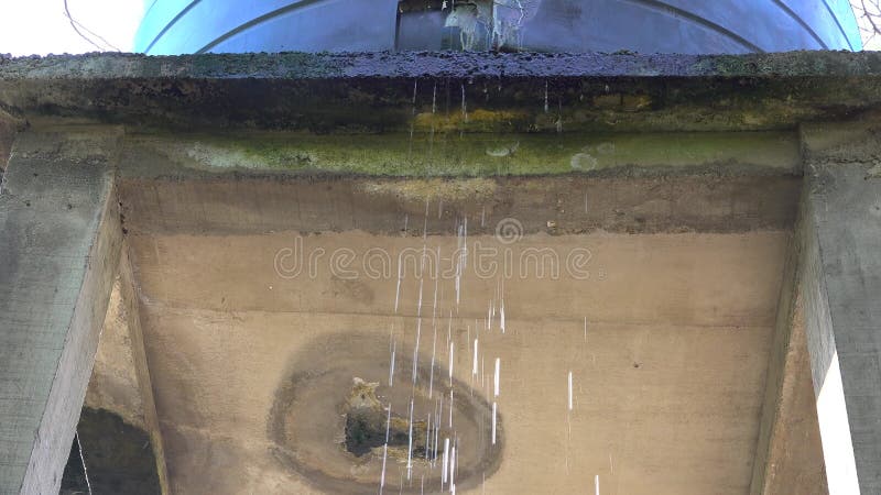 A water tank drips down stock video. Video of outdoors - 333082621
