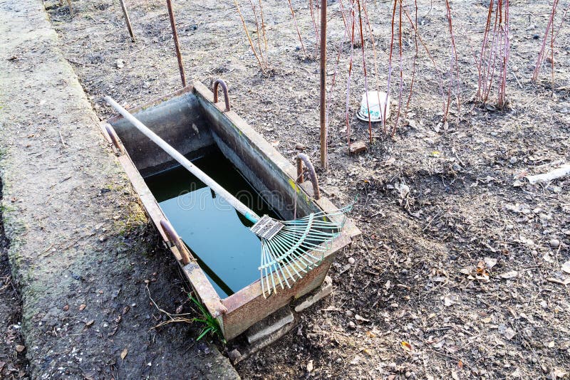 Water Tank in Empty Garden in Winter Stock Photo - Image of raspberry ...