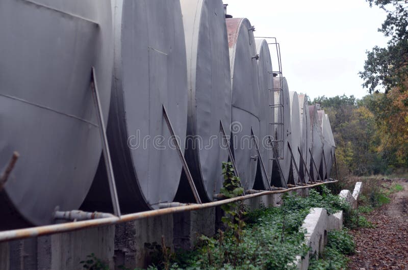 Water Tanks at the Edge of the Field Stock Photo - Image of tanks ...