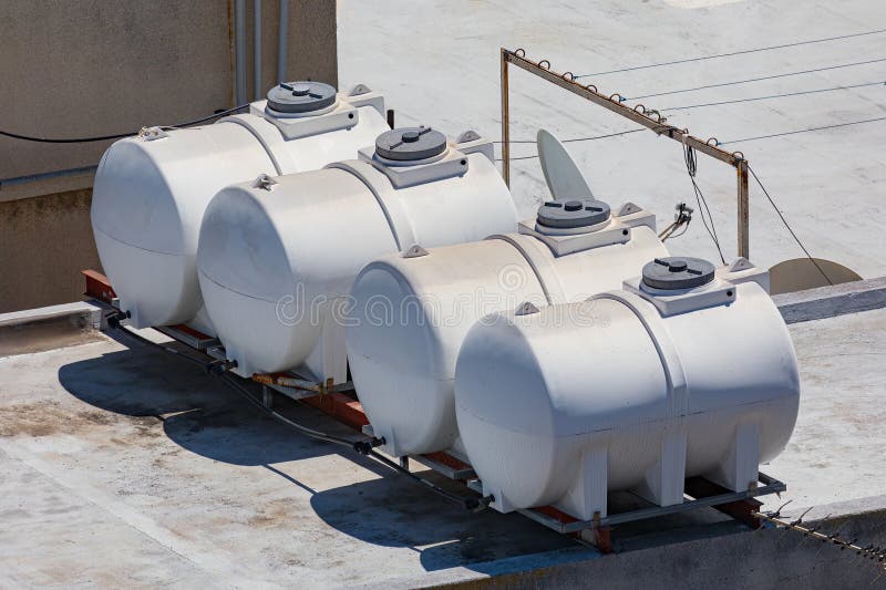 Water Tanks on the Roof of the Building Stock Photo - Image of pipeline ...