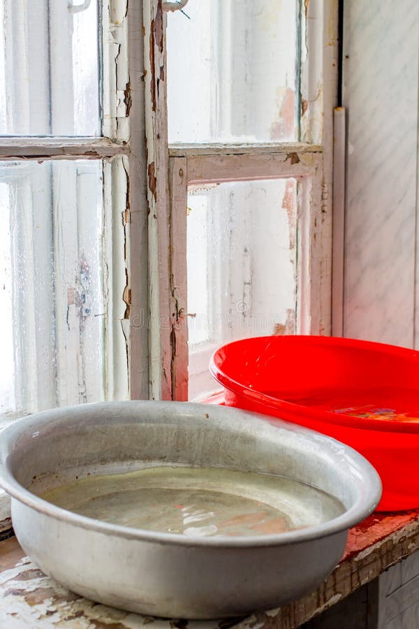 Water Tanks on the Windowsill Stock Image - Image of room, tanks: 140836471