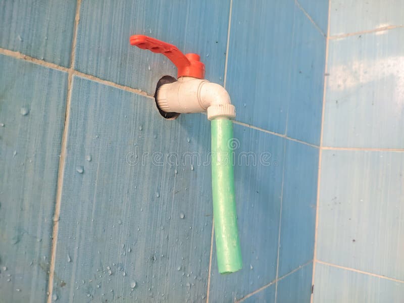 The Water Tap in the Bathroom, with Blue Ceramic Stock Image - Image of ...