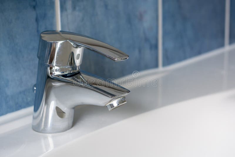 Water Tap in the Bathroom from the Side Stock Photo - Image of shiny ...